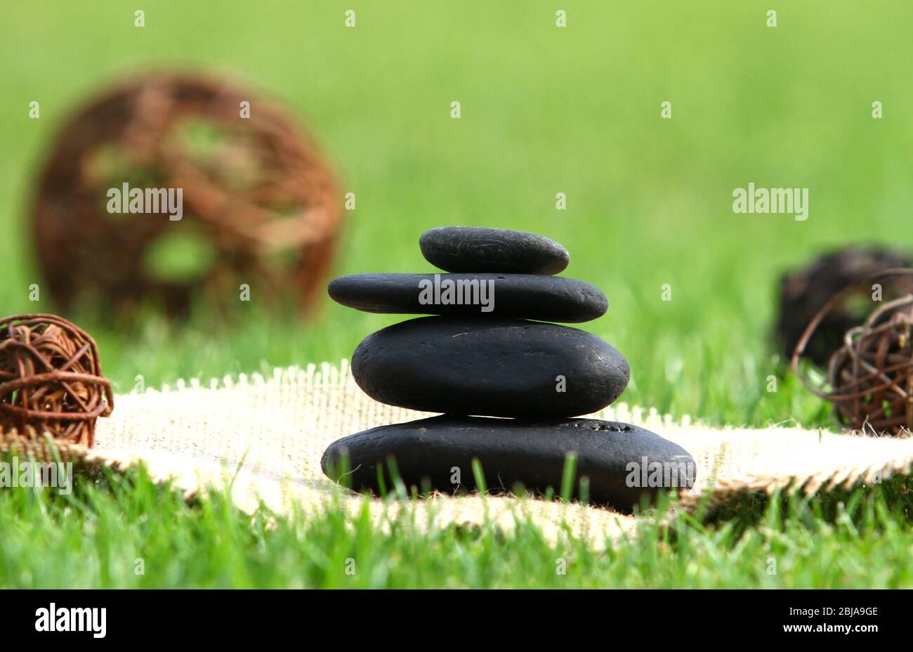 Top view of hot spa stones set for massage treatment on gray. Nature ...