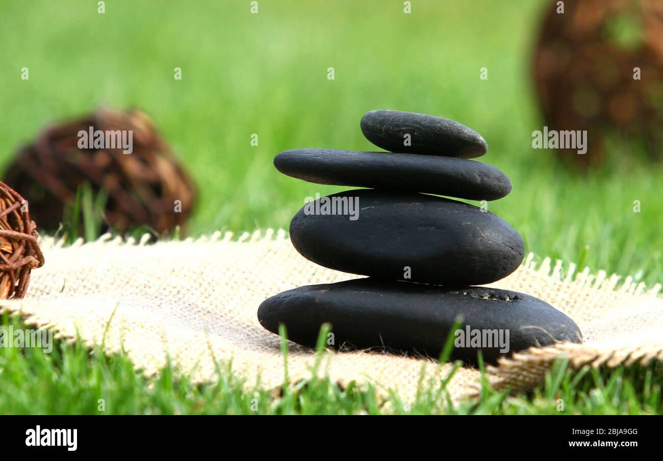 Top view of hot spa stones set for massage treatment on gray. Nature ...