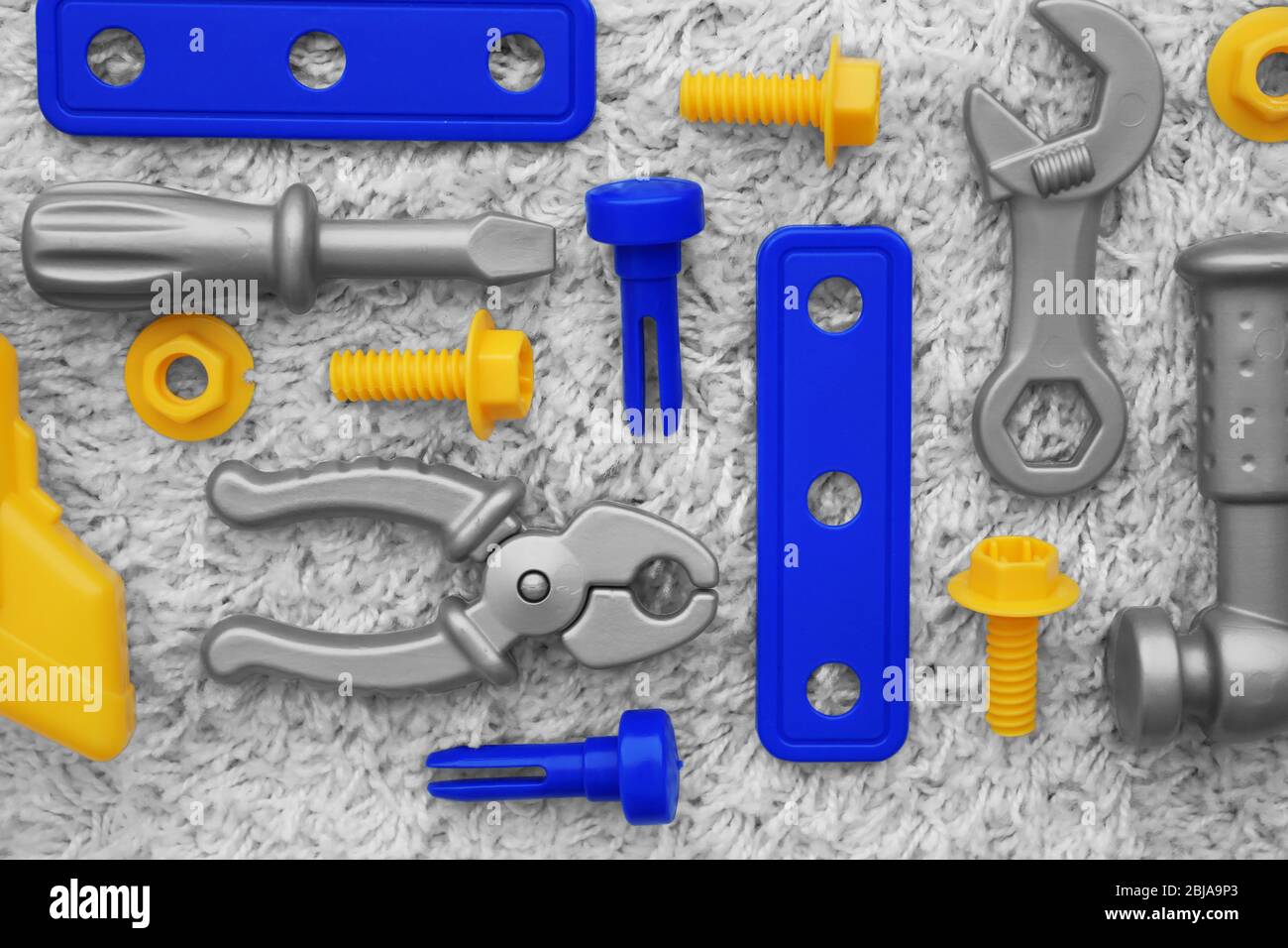 Plastic toy tools hi-res stock photography and images - Alamy