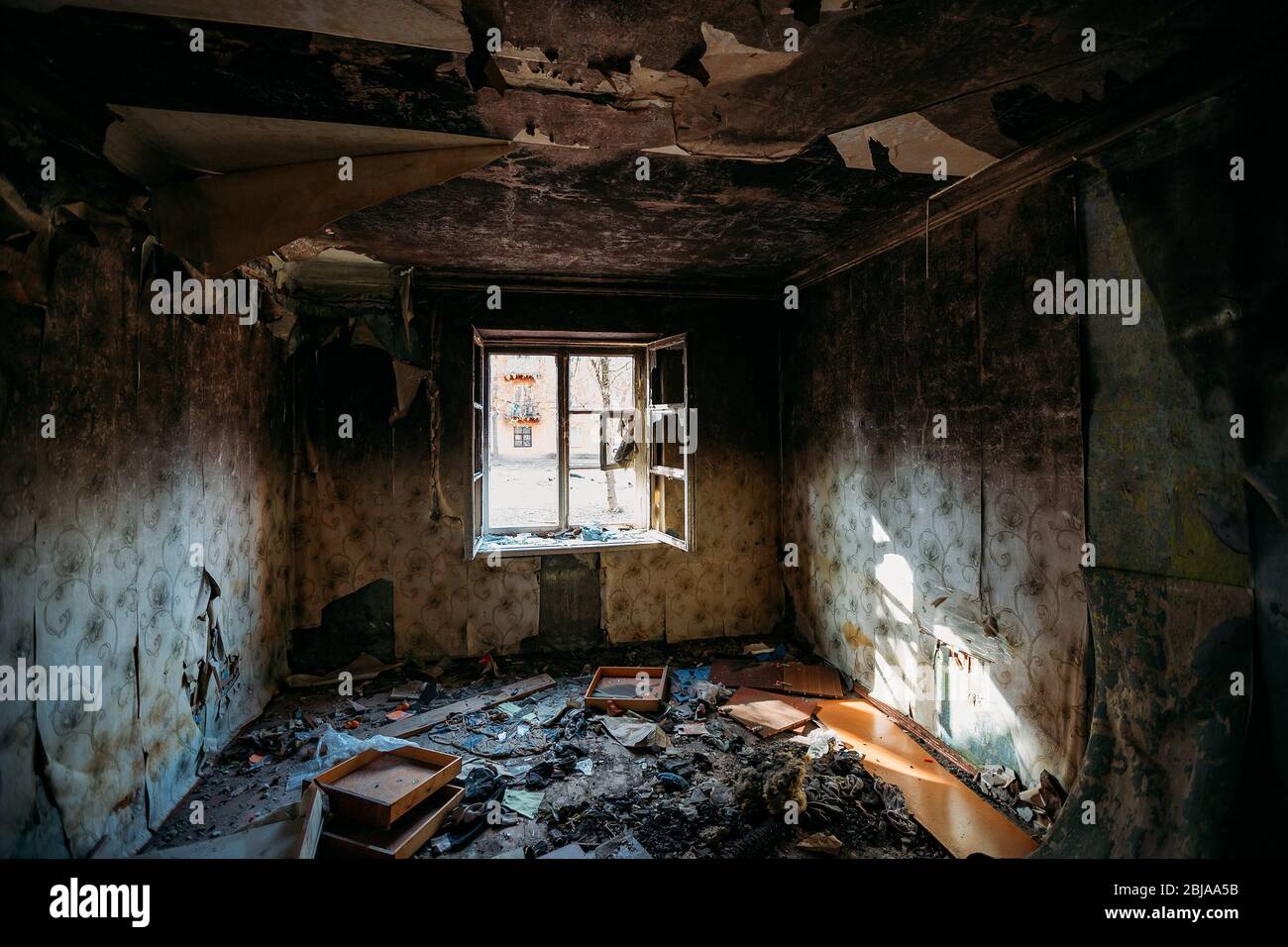 Burnt old rural house interior. Consequences of fire Stock Photo - Alamy