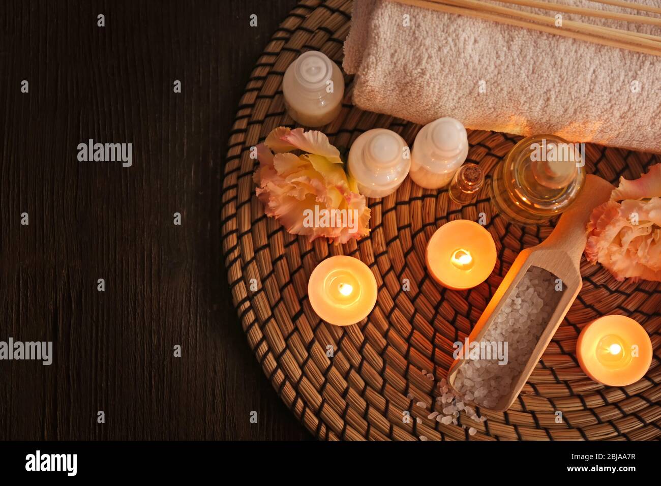 Beautiful spa composition with flowers on wooden background Stock Photo ...