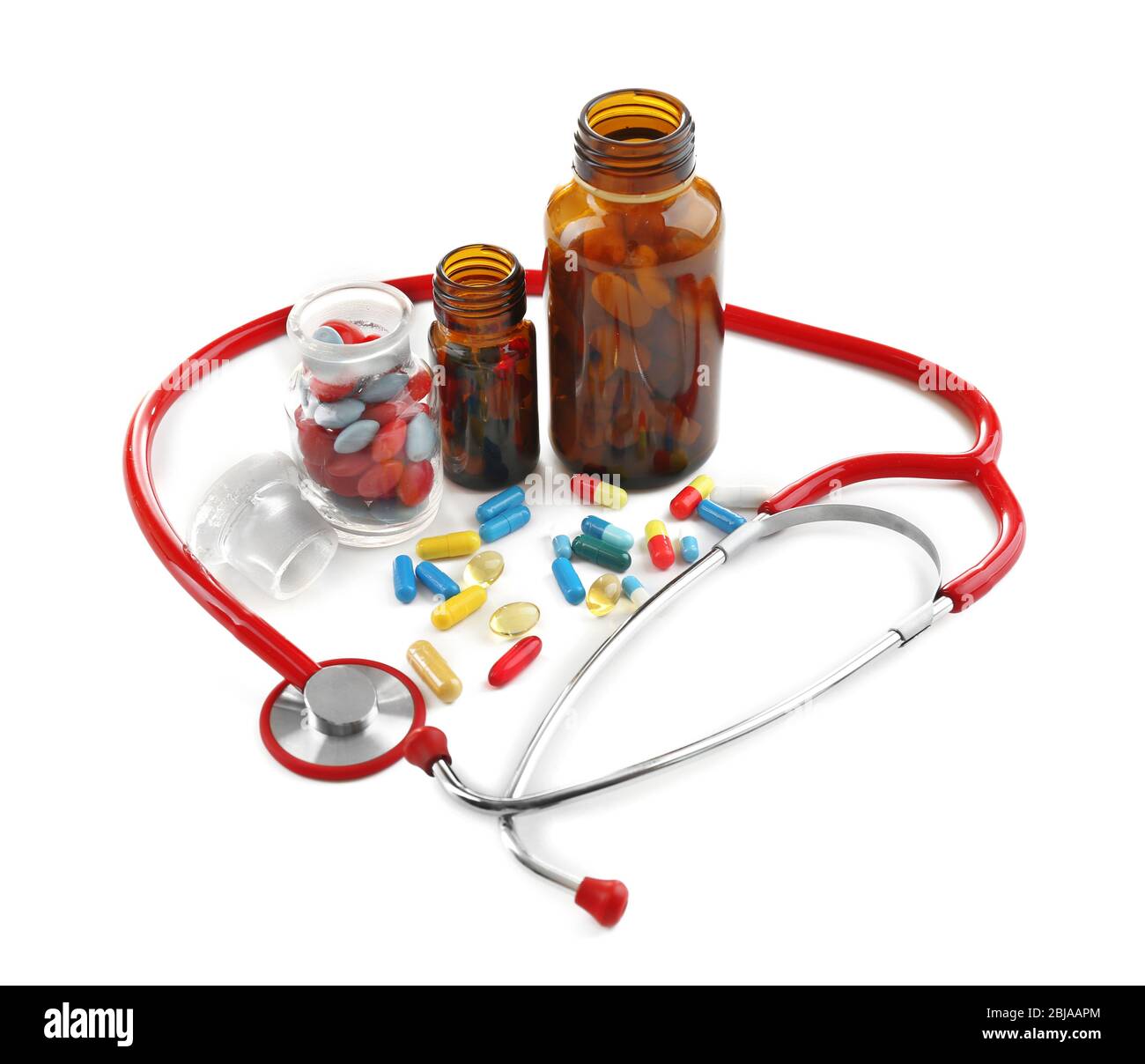 Stethoscope with colourful pills isolated on white Stock Photo - Alamy