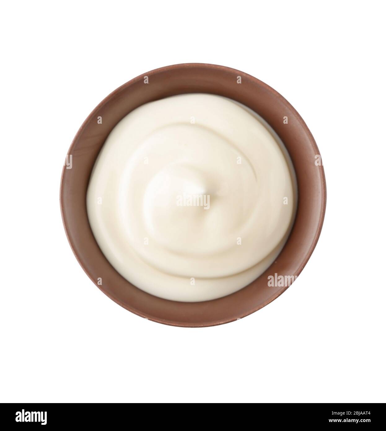 Bowl of fresh cream isolated on white Stock Photo - Alamy