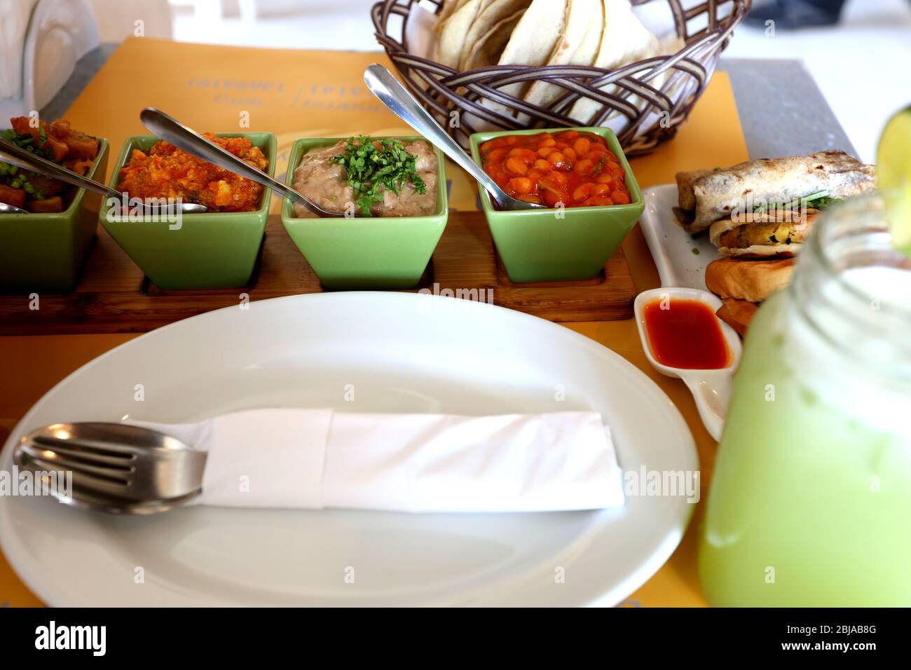 Bahrain breakfast of beans, and flat bread, with mint lemonade, Saffron ...