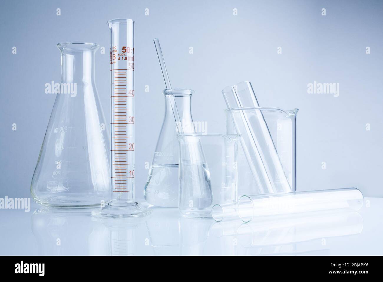 Group of laboratory glassware on table, Symbolic of science research ...