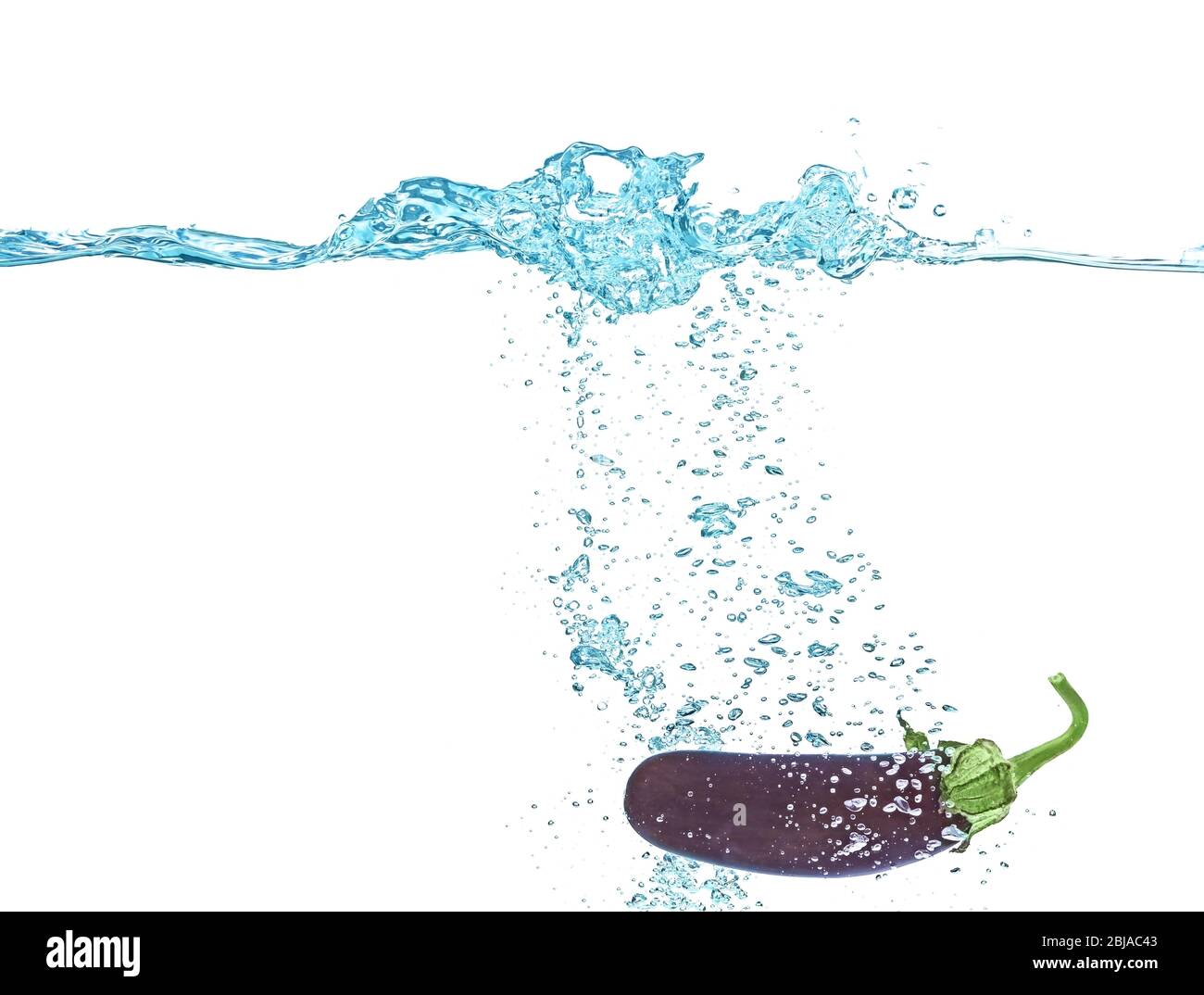 Eggplant and water splash hi-res stock photography and images - Alamy