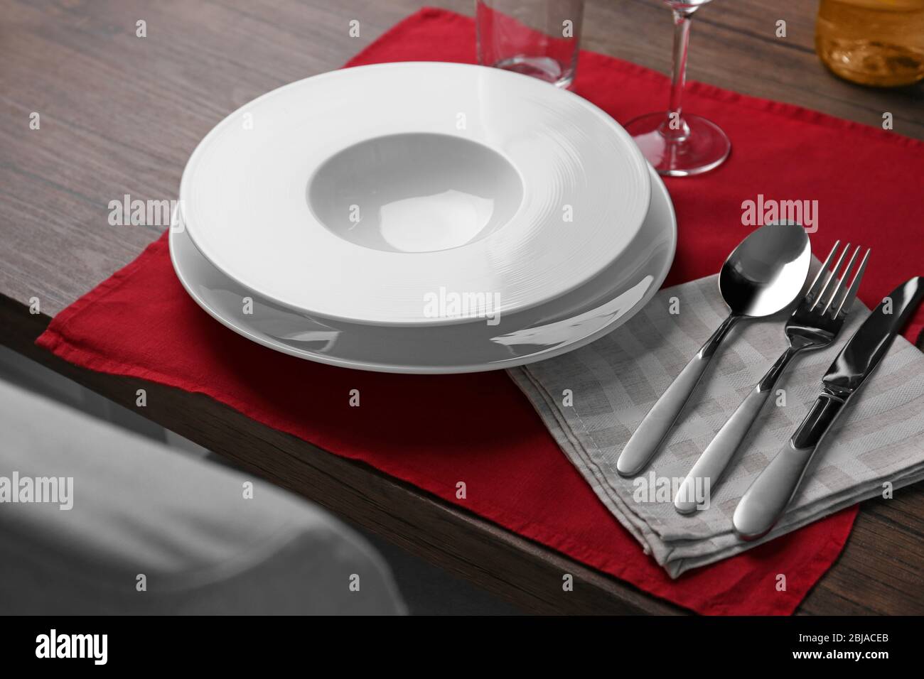 Elegant table appointments with red napkin Stock Photo - Alamy