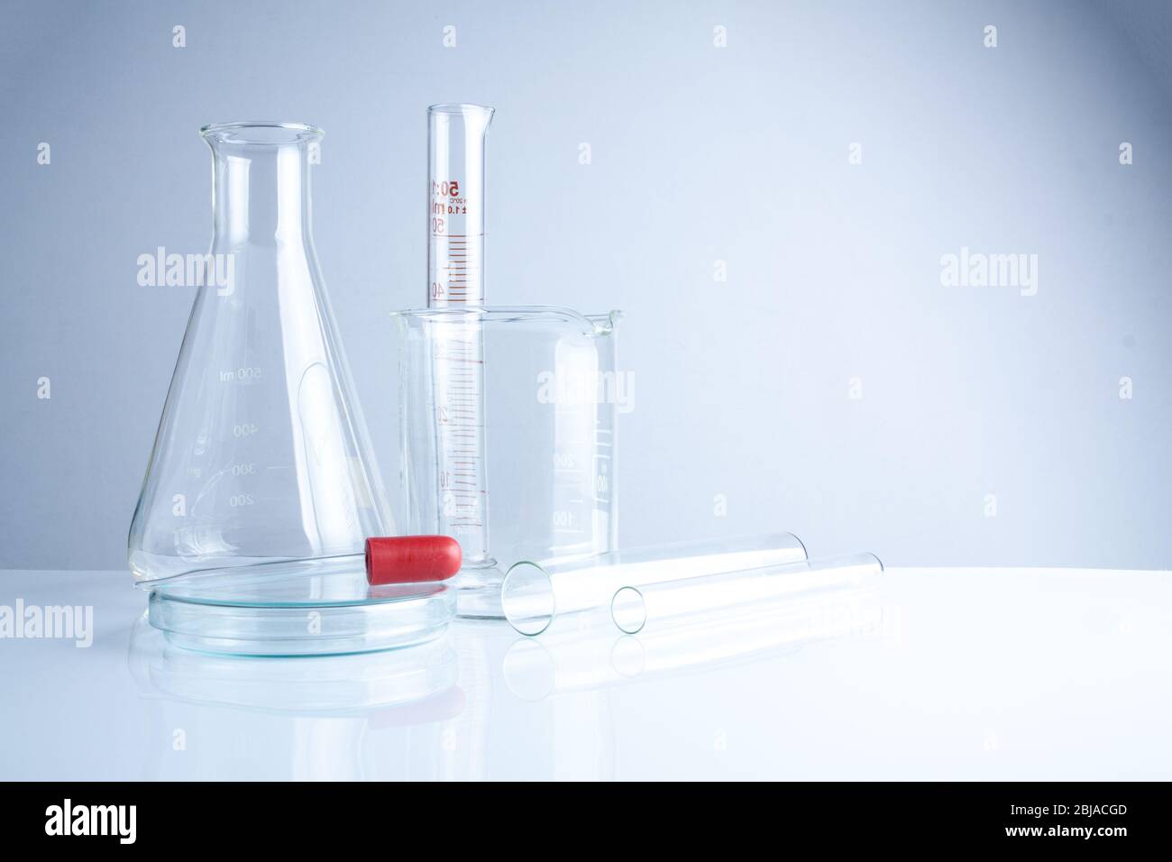 Group of laboratory glassware on table, Symbolic of science research ...