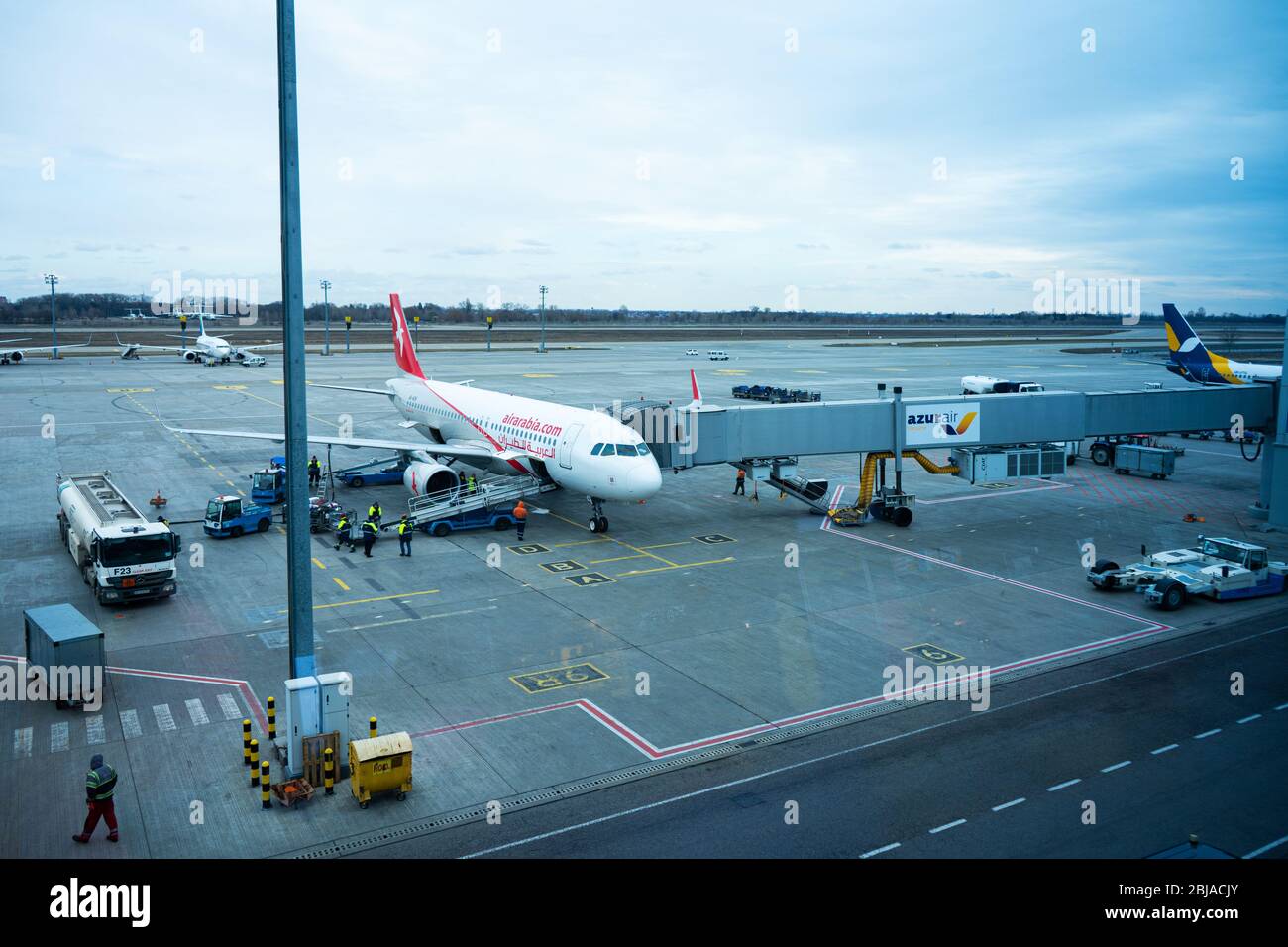 View of the aircraft parking at the airport. The plane is being ...