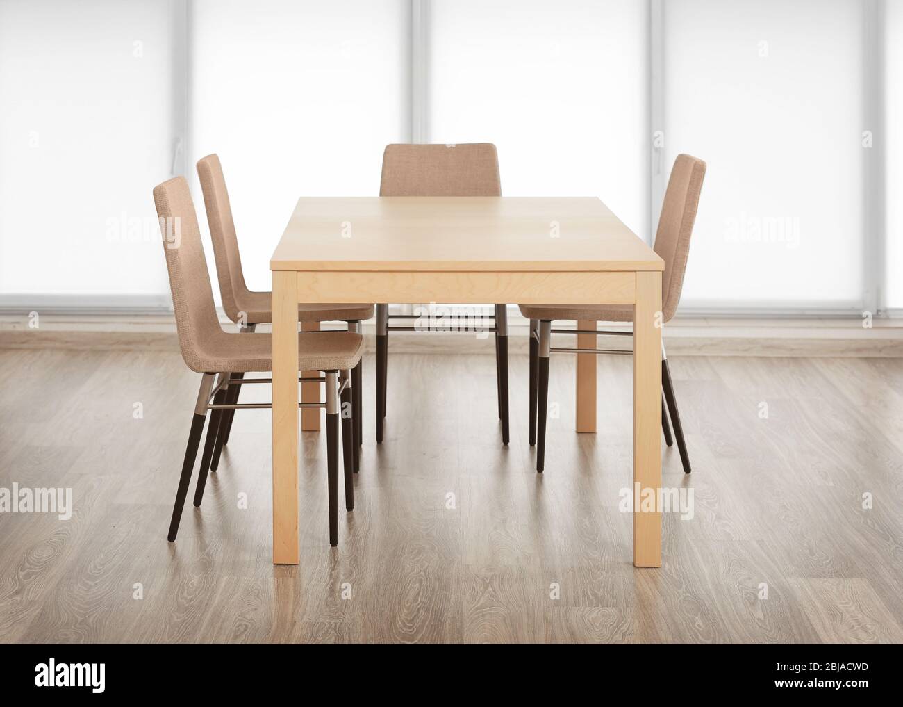 Modern interior with table and chairs Stock Photo - Alamy