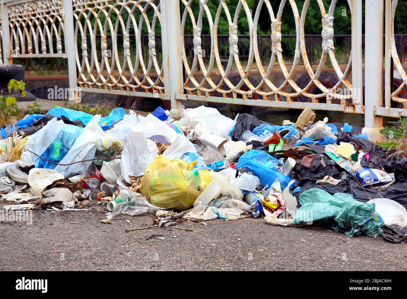 Garbage dump smelly trash in garbage bags hi-res stock photography and ...