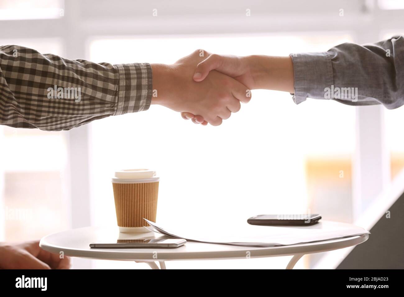 Business people handshaking Stock Photo - Alamy