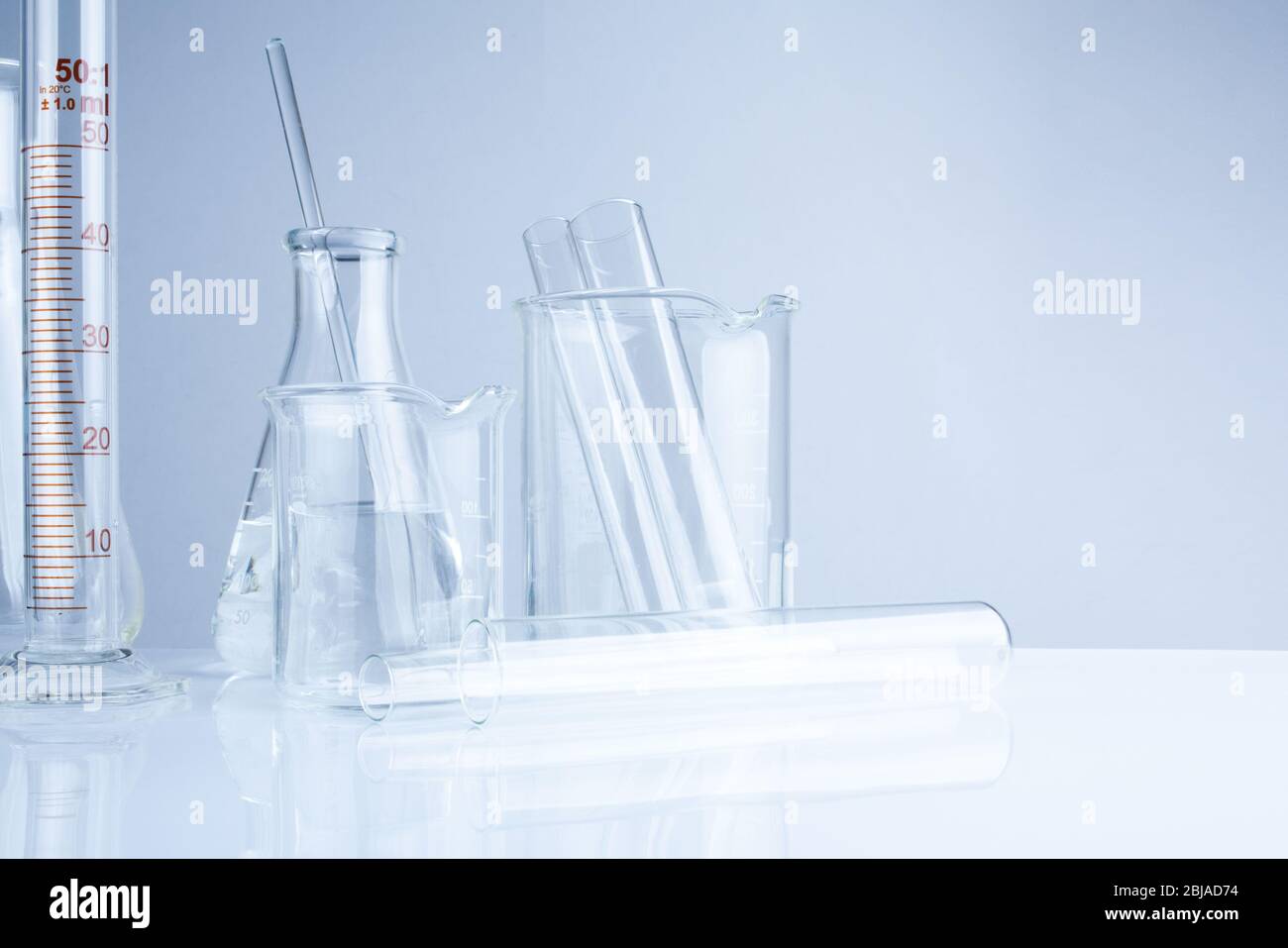 Group of laboratory glassware on table, Symbolic of science research ...