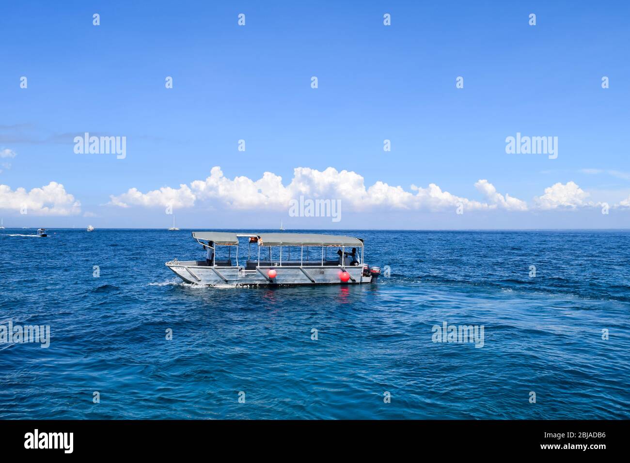 beautiful side view of a boat in ocean Stock Photo - Alamy