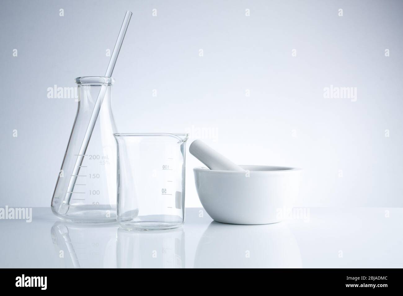 Group of laboratory glassware on table, Symbolic of science research ...