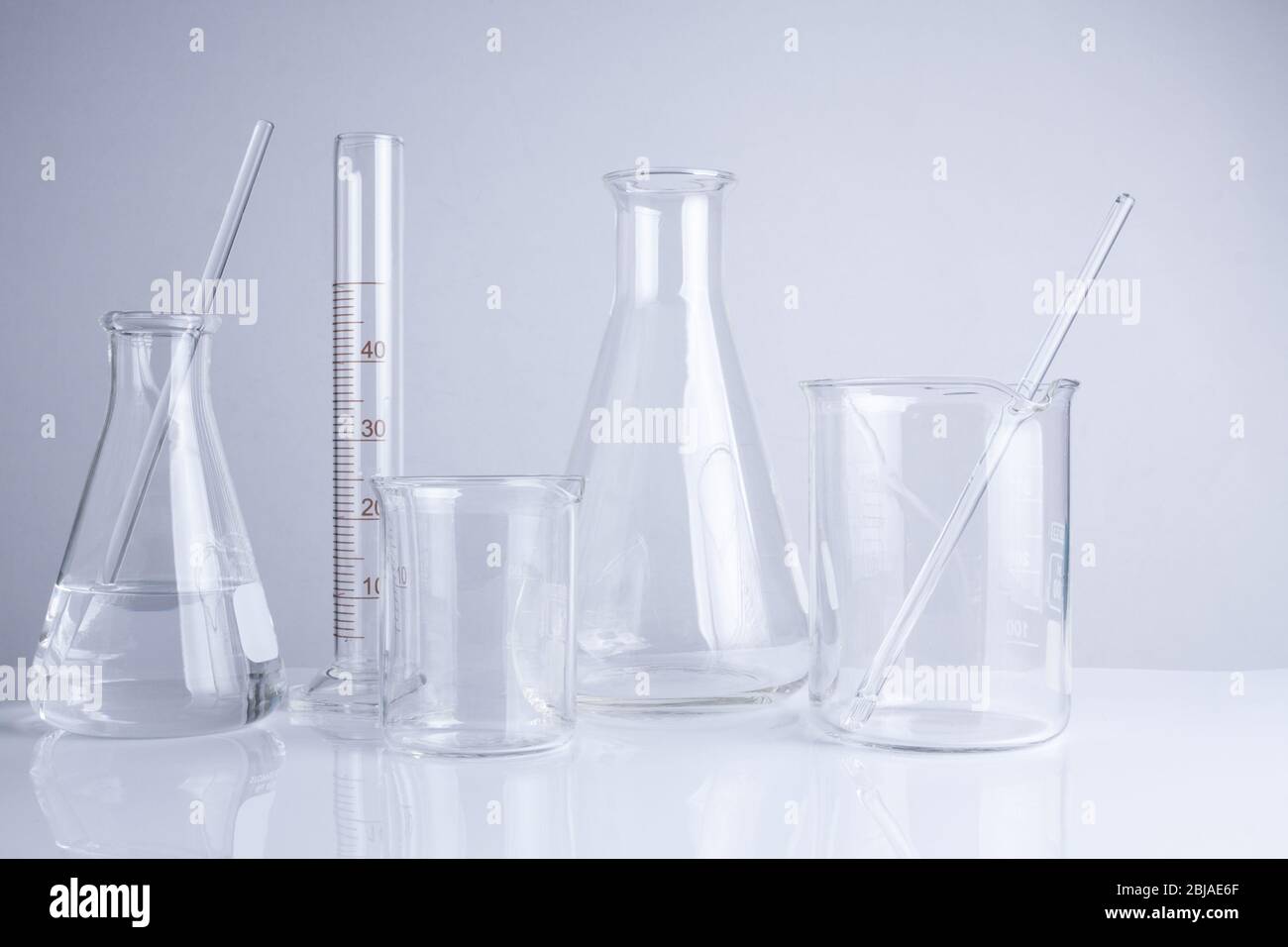 Group of laboratory glassware on table, Symbolic of science research ...