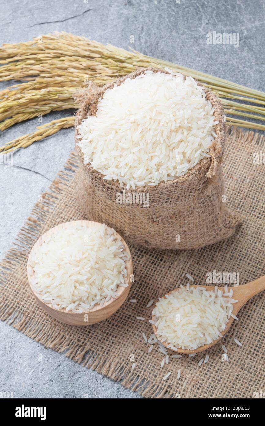 thai fragrant jasmine rice in a bowl with gold spike on Sack Stock ...