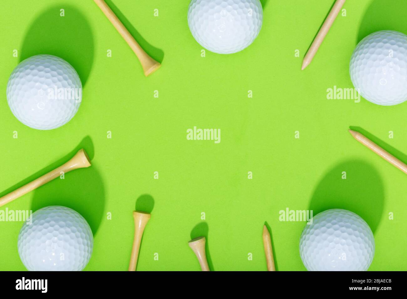 Golf background. Group of golf balls and tee on green background. Top ...