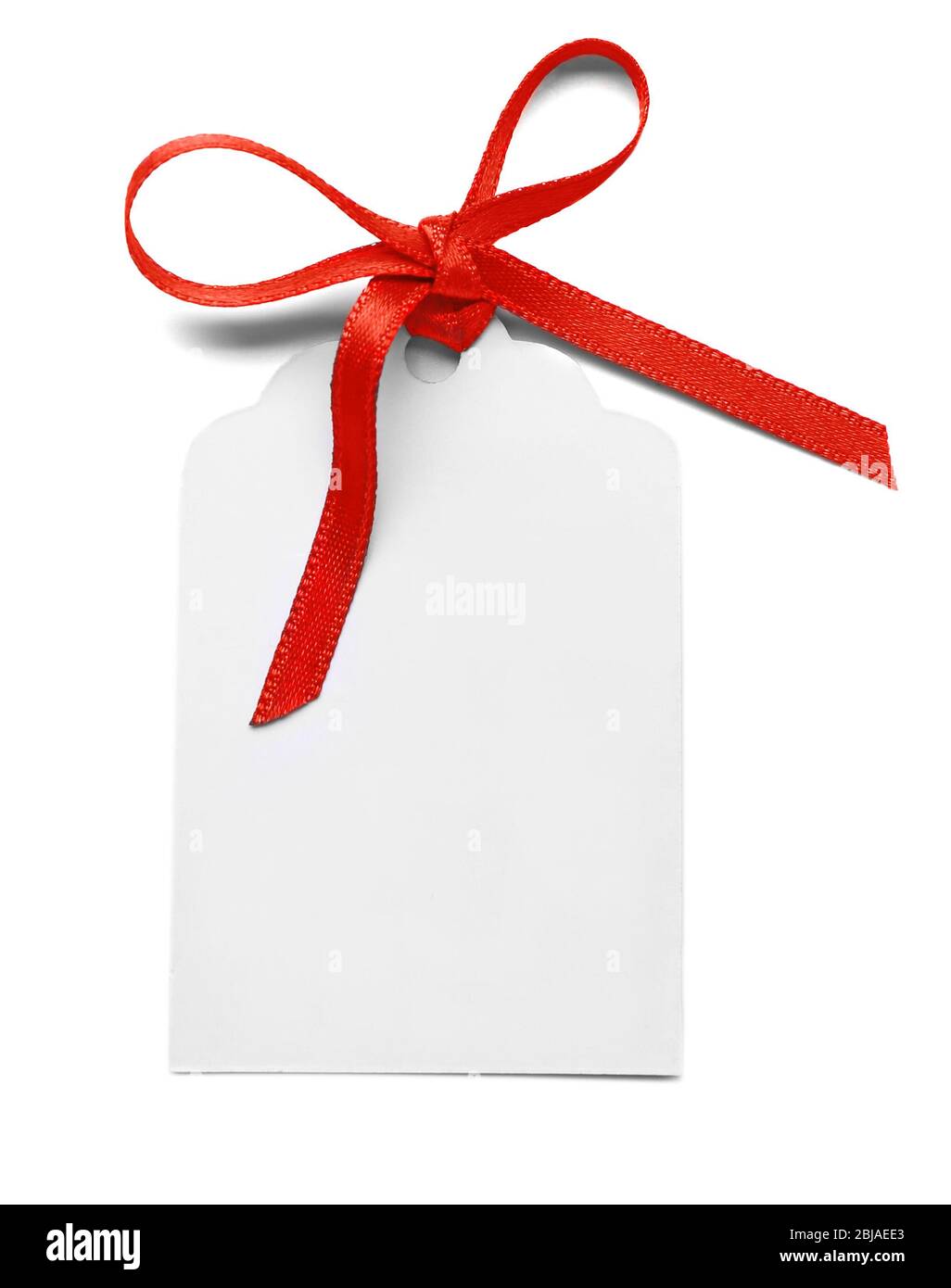 Card with a red ribbon isolated on white Stock Photo - Alamy