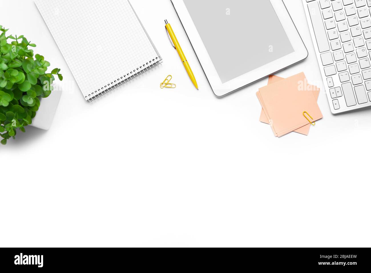 Office tools on white background Stock Photo - Alamy