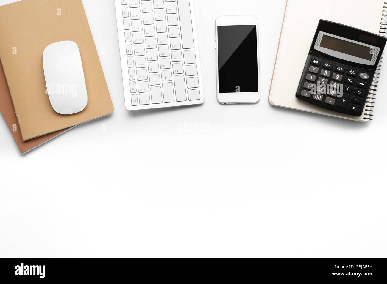 Office tools on white background Stock Photo - Alamy