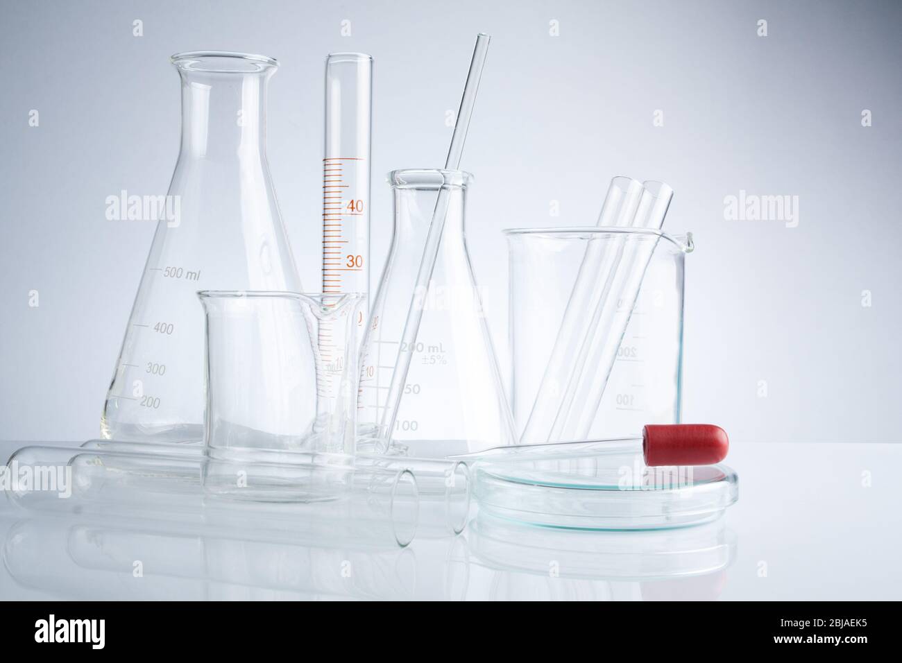 Group of laboratory glassware on table, Symbolic of science research ...