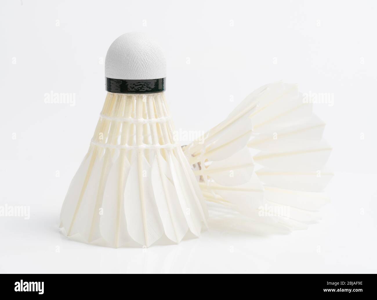 Shuttlecock on white background Stock Photo - Alamy