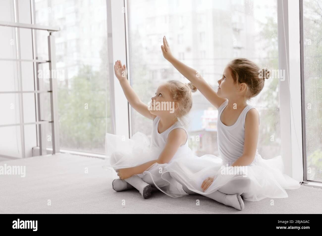 Cute girls training at ballet school Stock Photo - Alamy