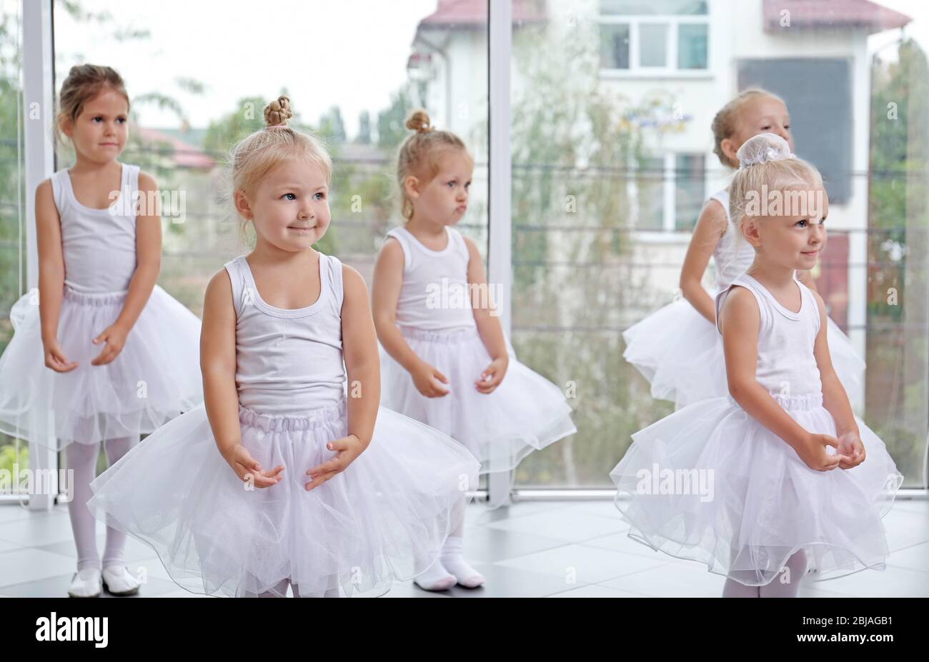 Cute girls practicing ballet in class Stock Photo - Alamy