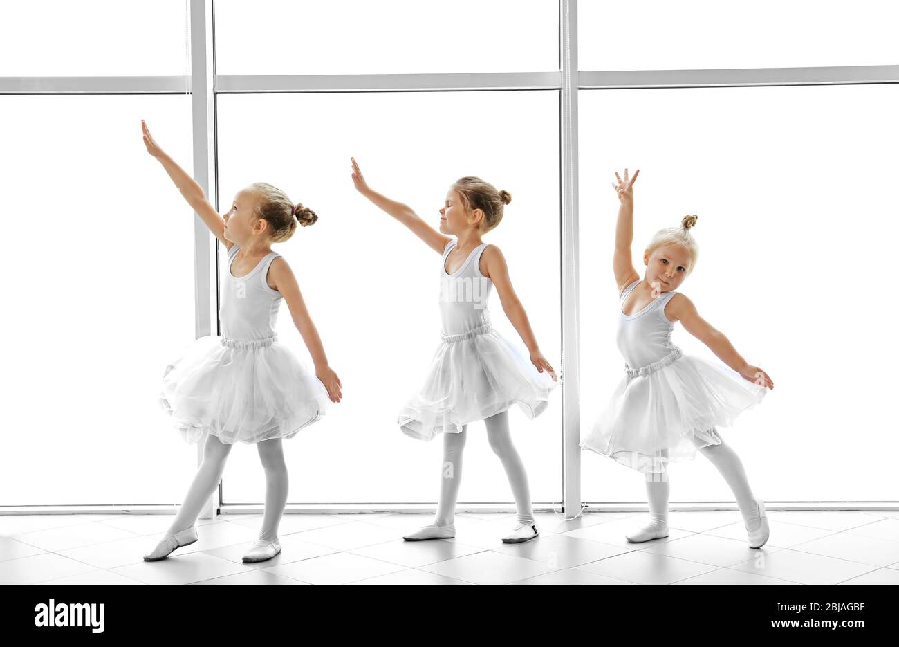 Cute girls practicing ballet in class Stock Photo - Alamy