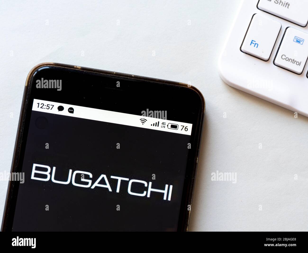 In this photo illustration e-commerce Bugatchi logo is seen displayed ...