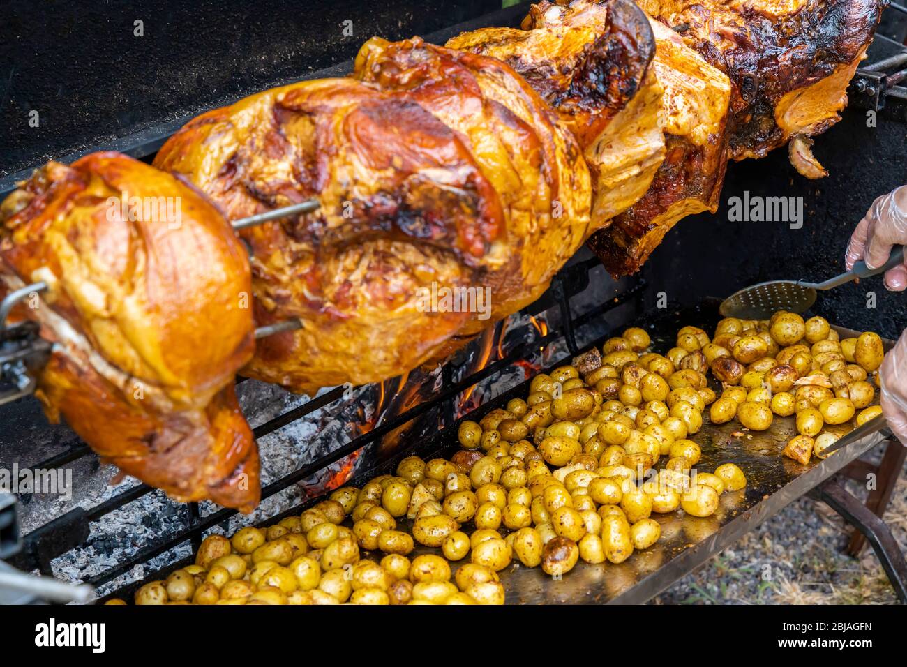 roast piglet at garden party Stock Photo - Alamy