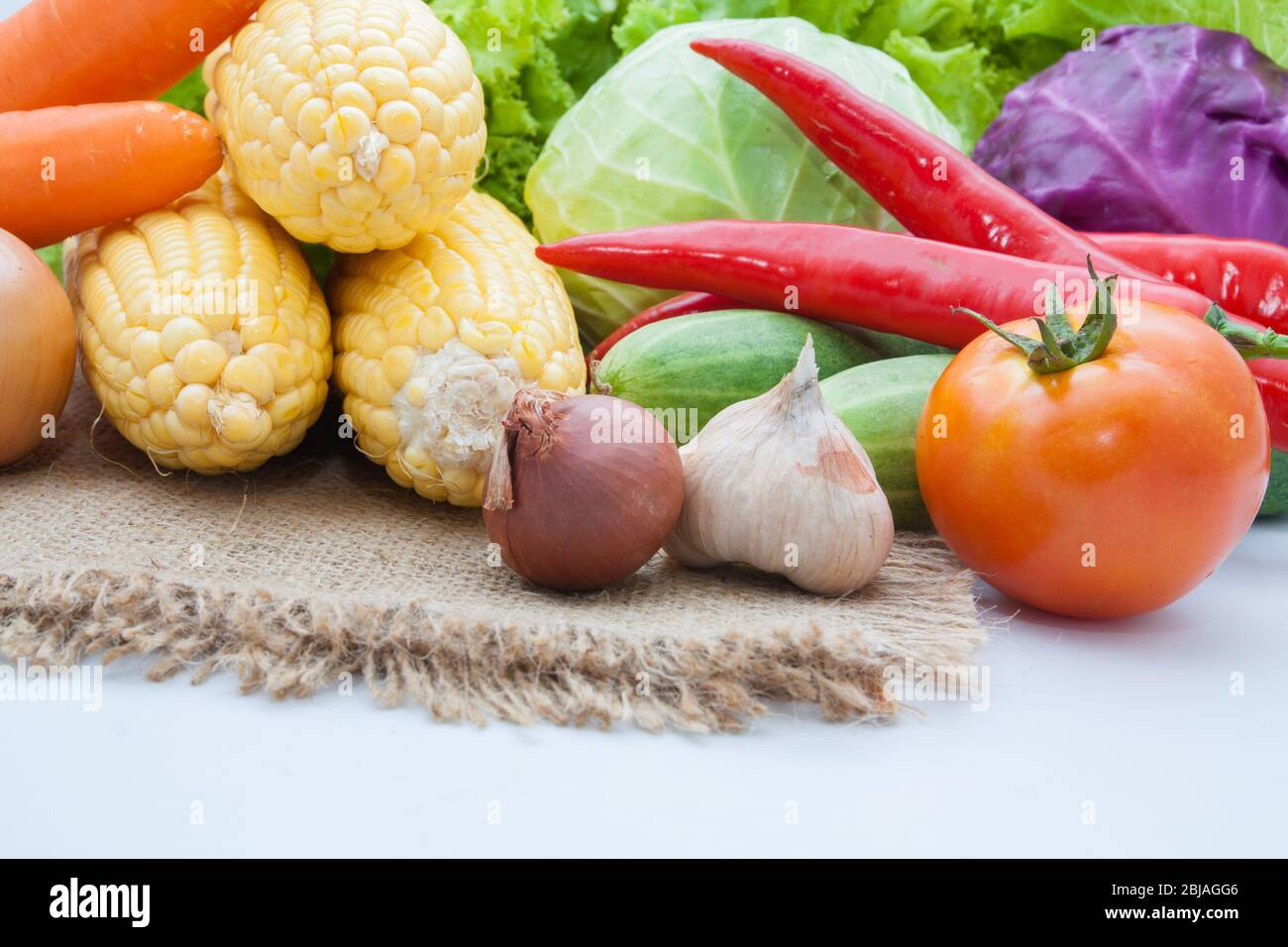 vegetables on sack background isolated Stock Photo - Alamy