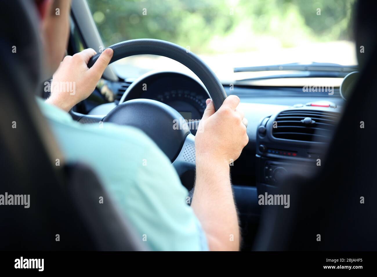 Man driving car Stock Photo - Alamy