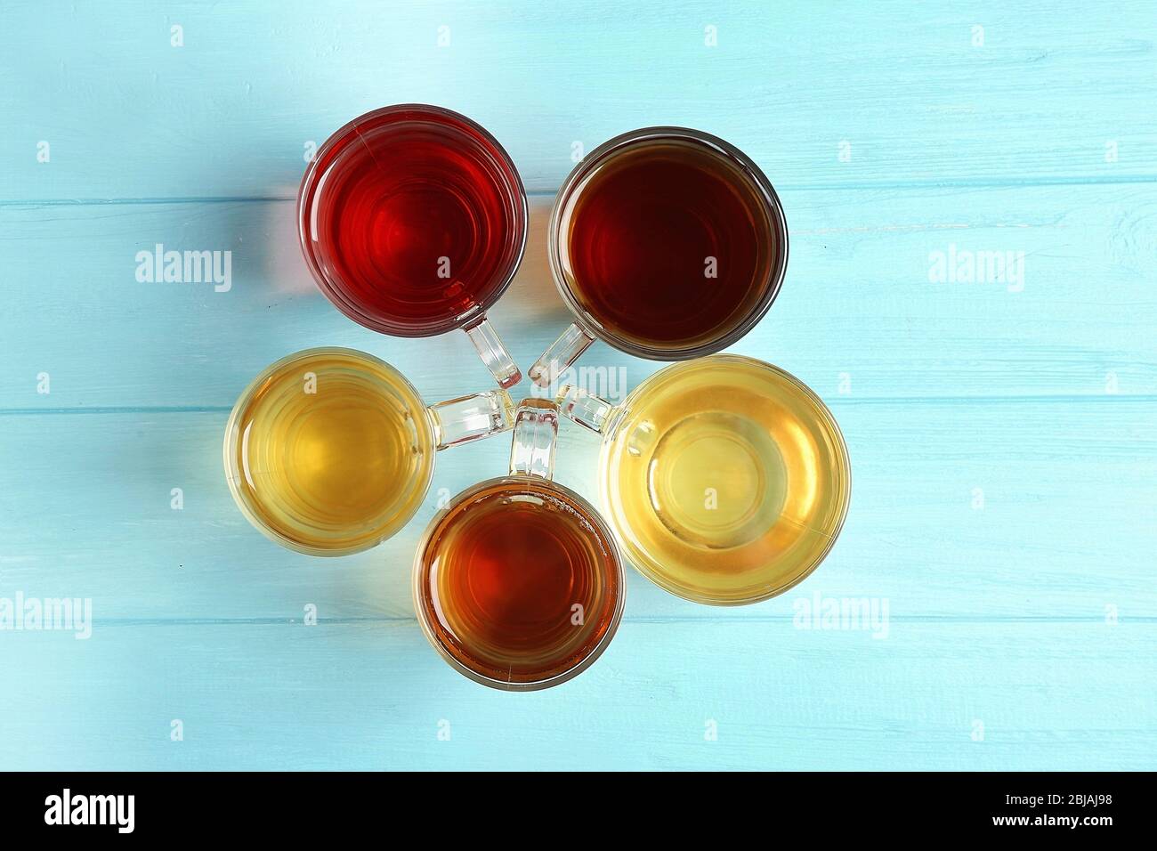 Cups of tea on table, top view Stock Photo - Alamy