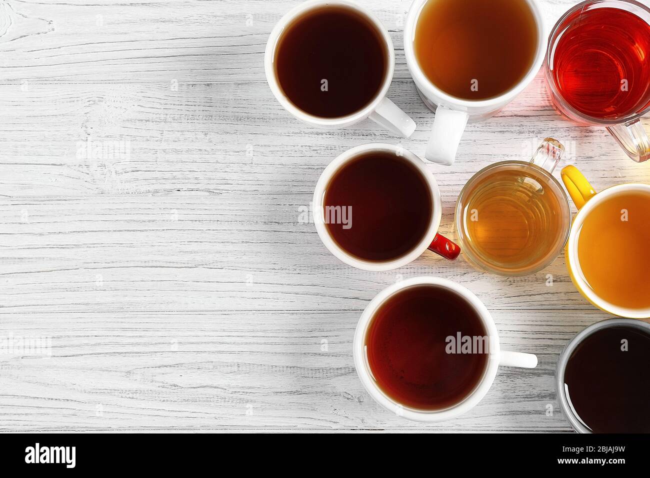 Cups of tea on table, top view Stock Photo - Alamy