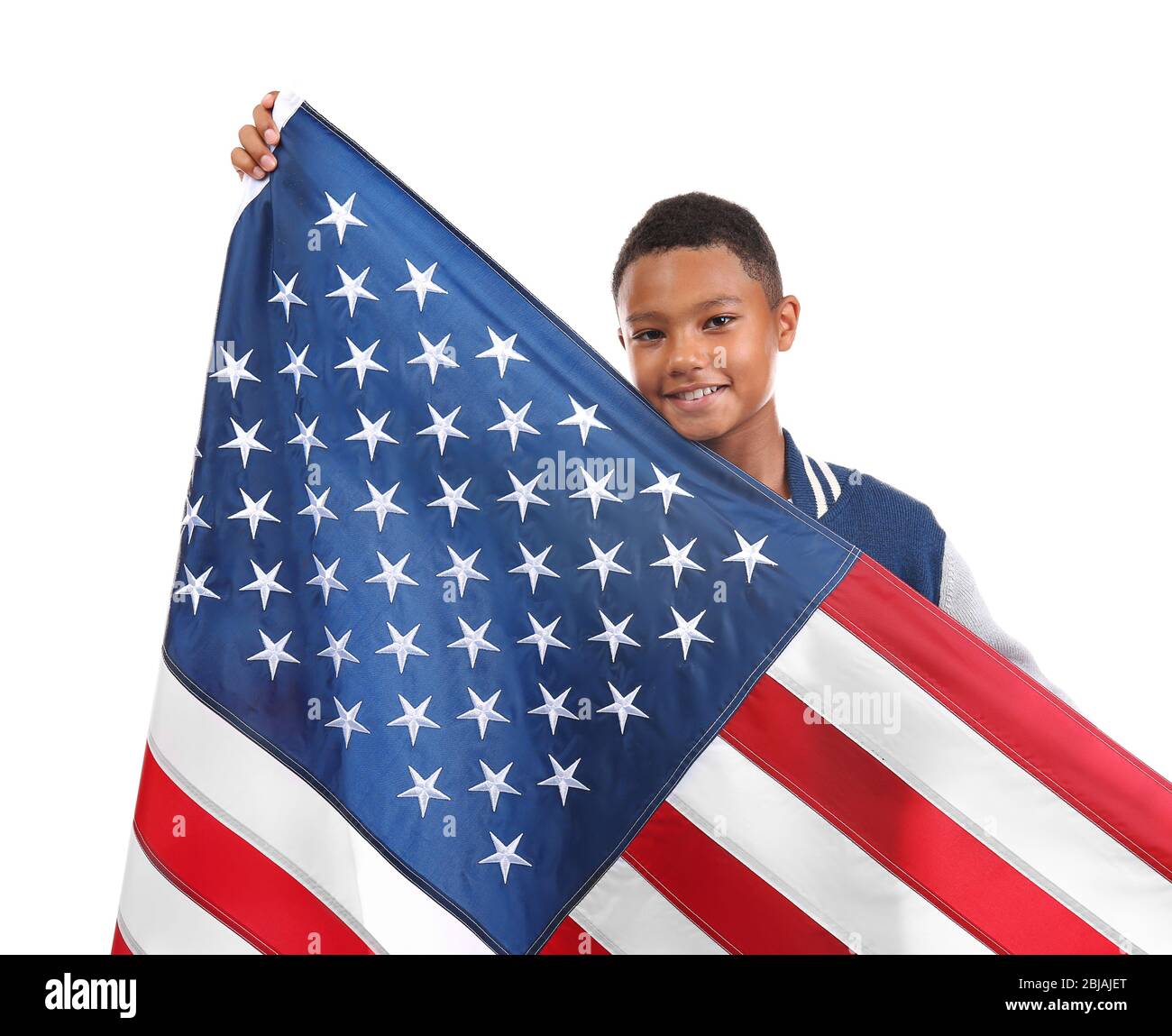 Boy holding American flag, isolated on white Stock Photo - Alamy