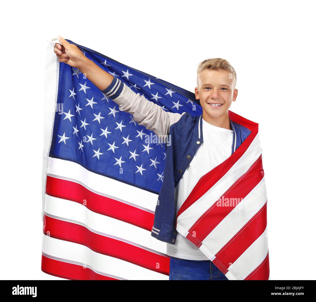 Boy holding American flag, isolated on white Stock Photo - Alamy