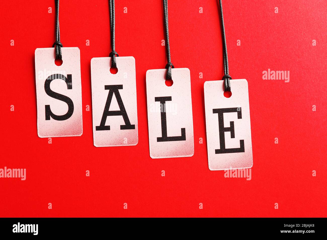 Sale labels on color background Stock Photo - Alamy