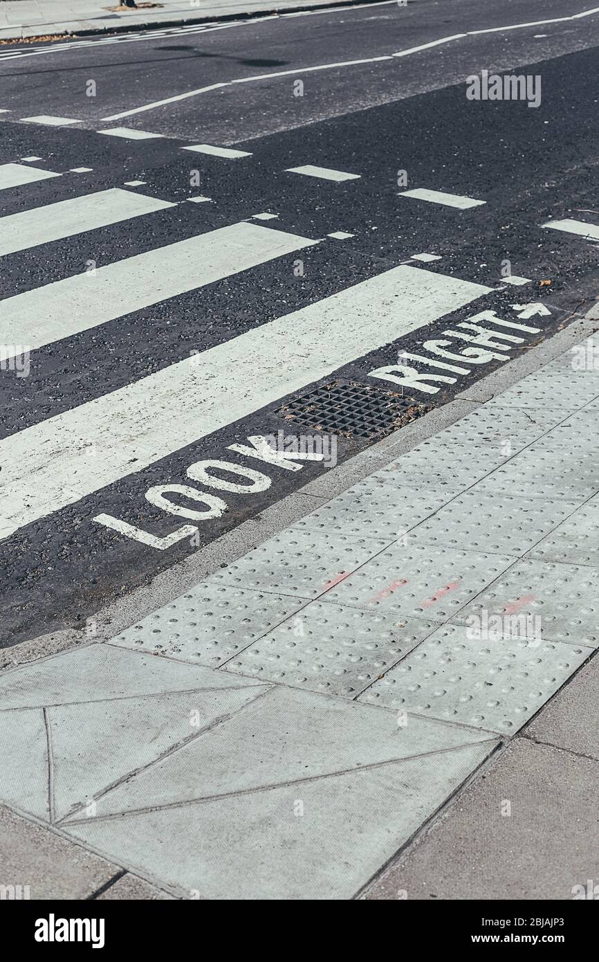 "Look right" road marking on a pedestrian crossing, reminding ...
