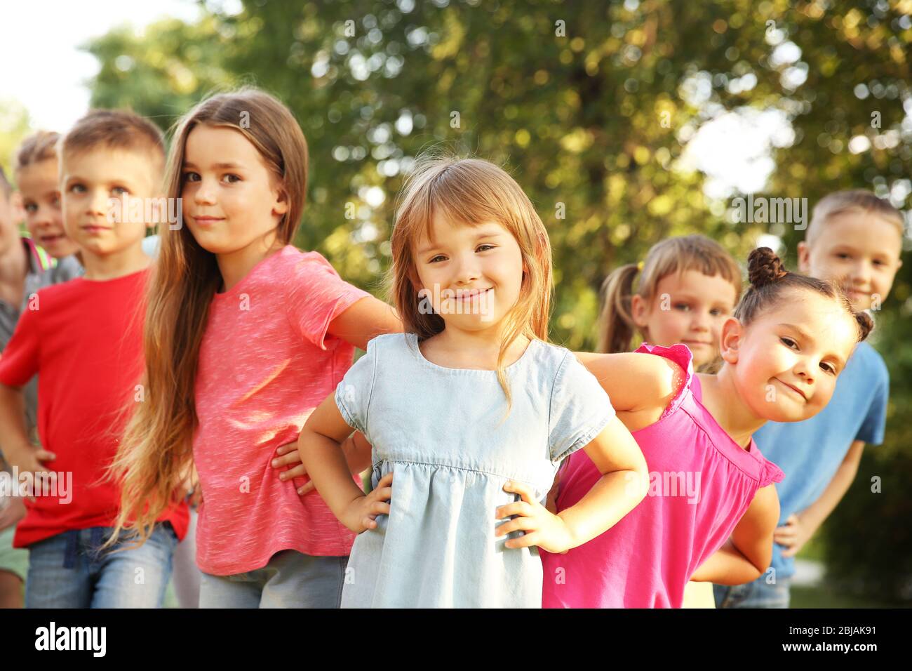 Group of happy kids in park Stock Photo - Alamy