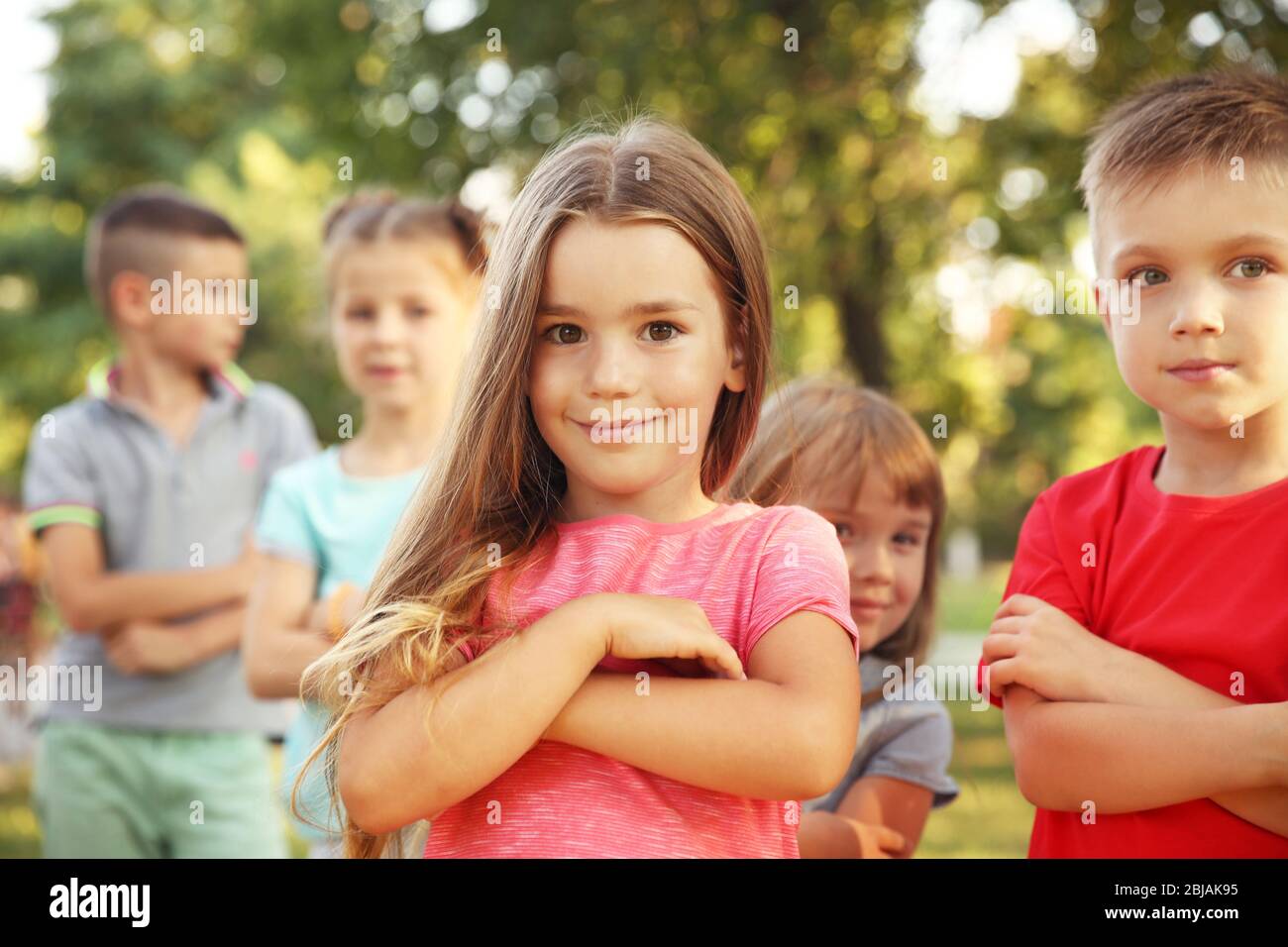 Group of happy kids in park Stock Photo - Alamy