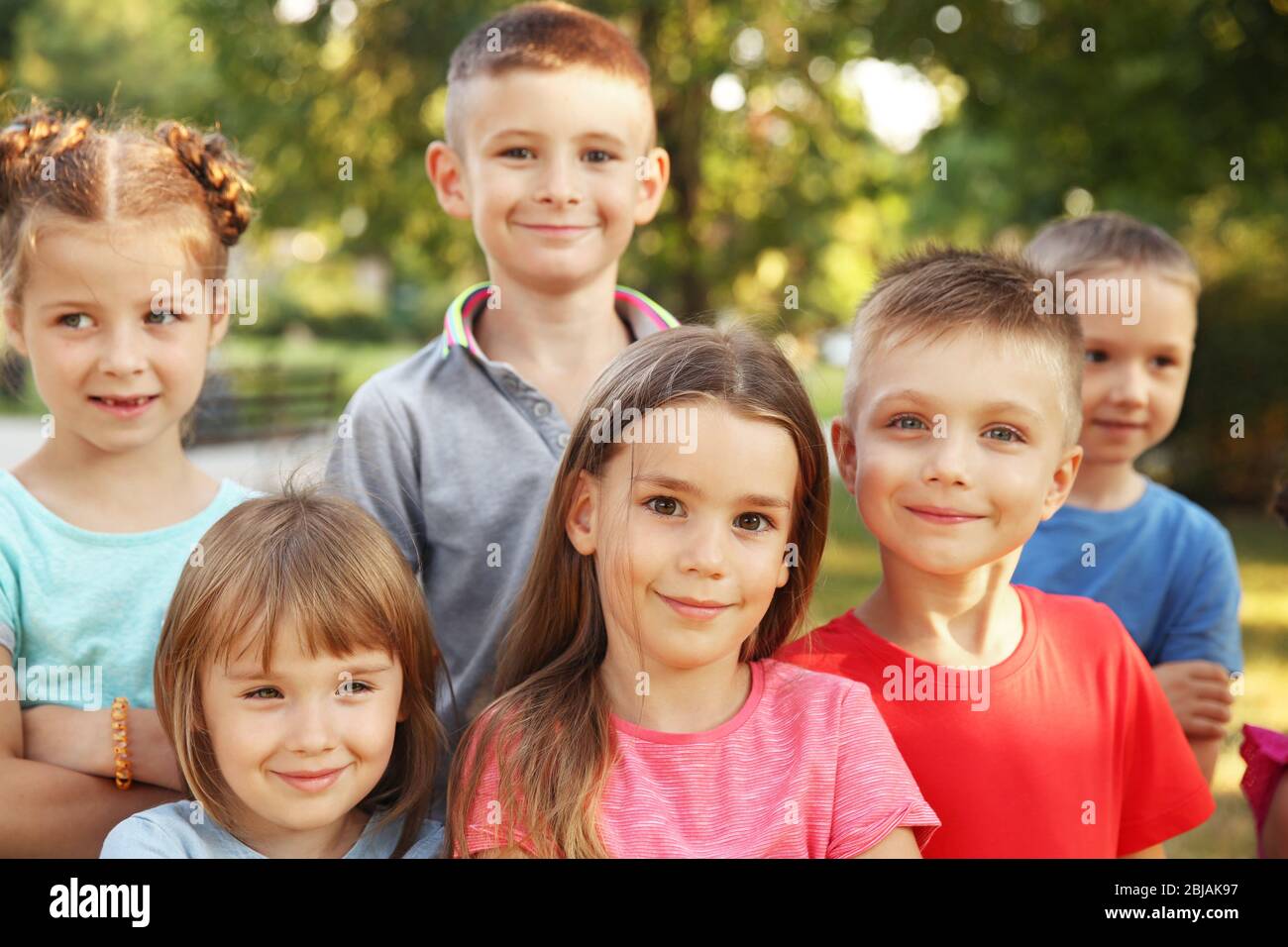 Group of happy kids in park Stock Photo - Alamy