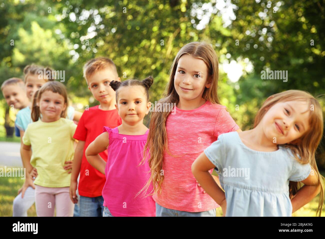 Group of happy kids in park Stock Photo - Alamy