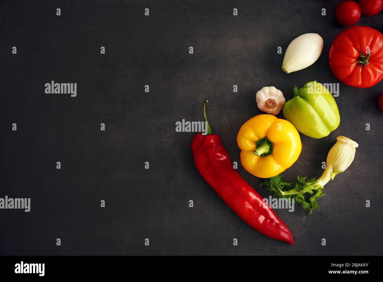 Fresh vegetables on grey background Stock Photo - Alamy