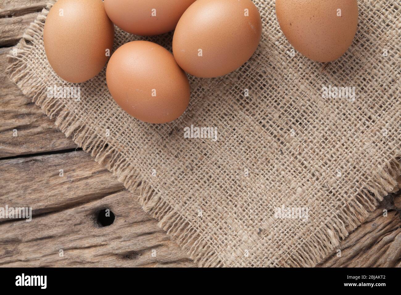 egg on sack background Stock Photo - Alamy
