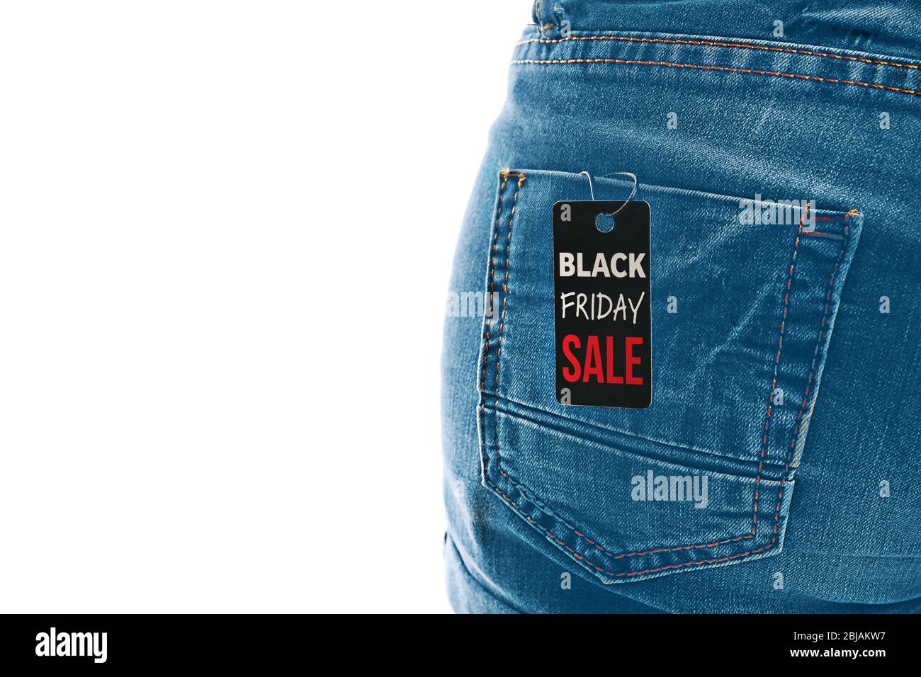Sale label on female jeans, isolated on white Stock Photo - Alamy
