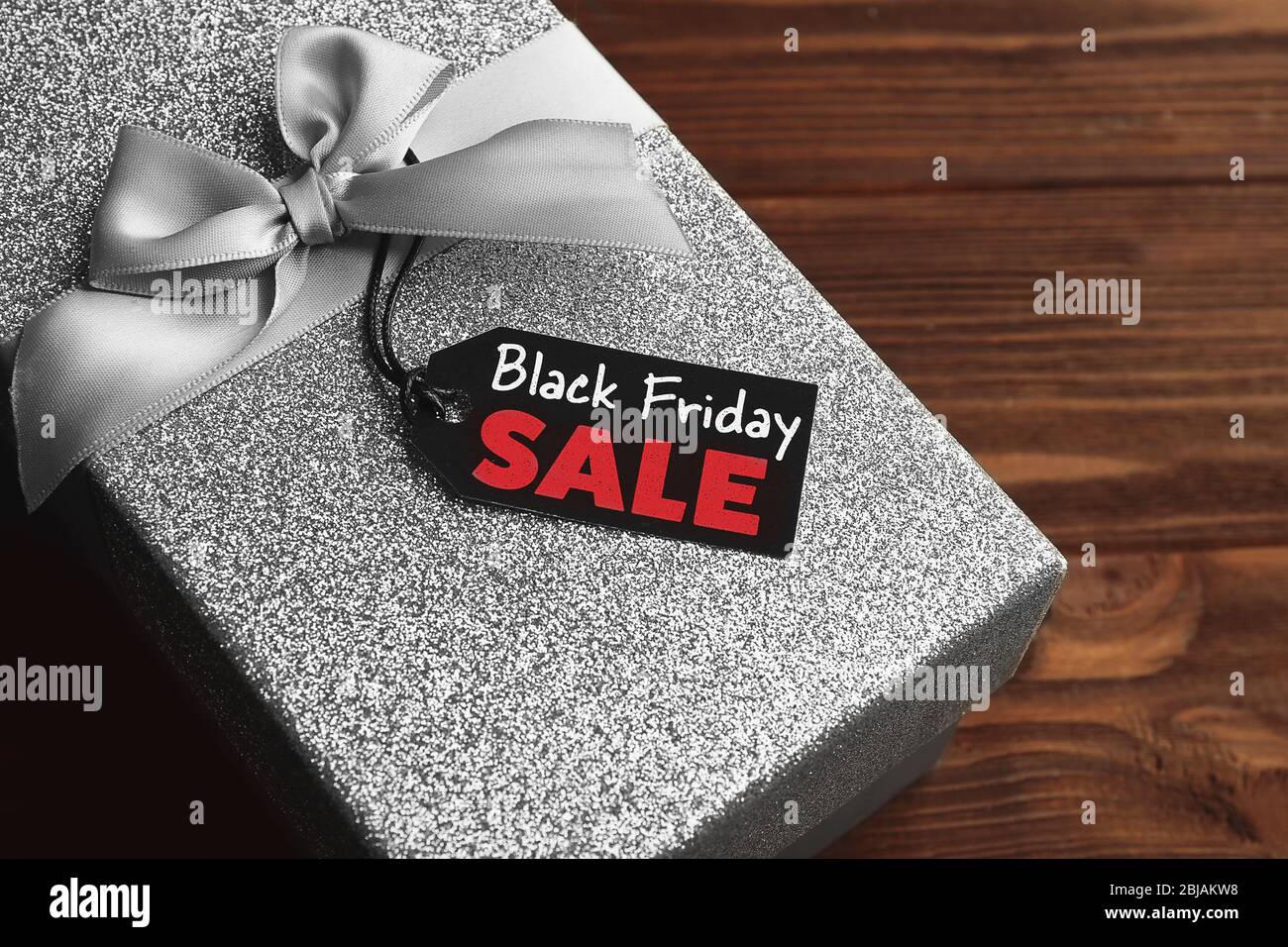 Sale label on gift box Stock Photo - Alamy