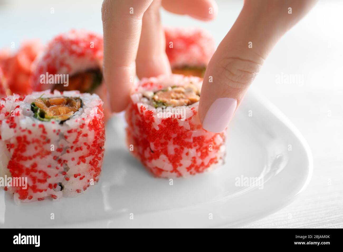 Female fingers holding fish hi-res stock photography and images - Alamy