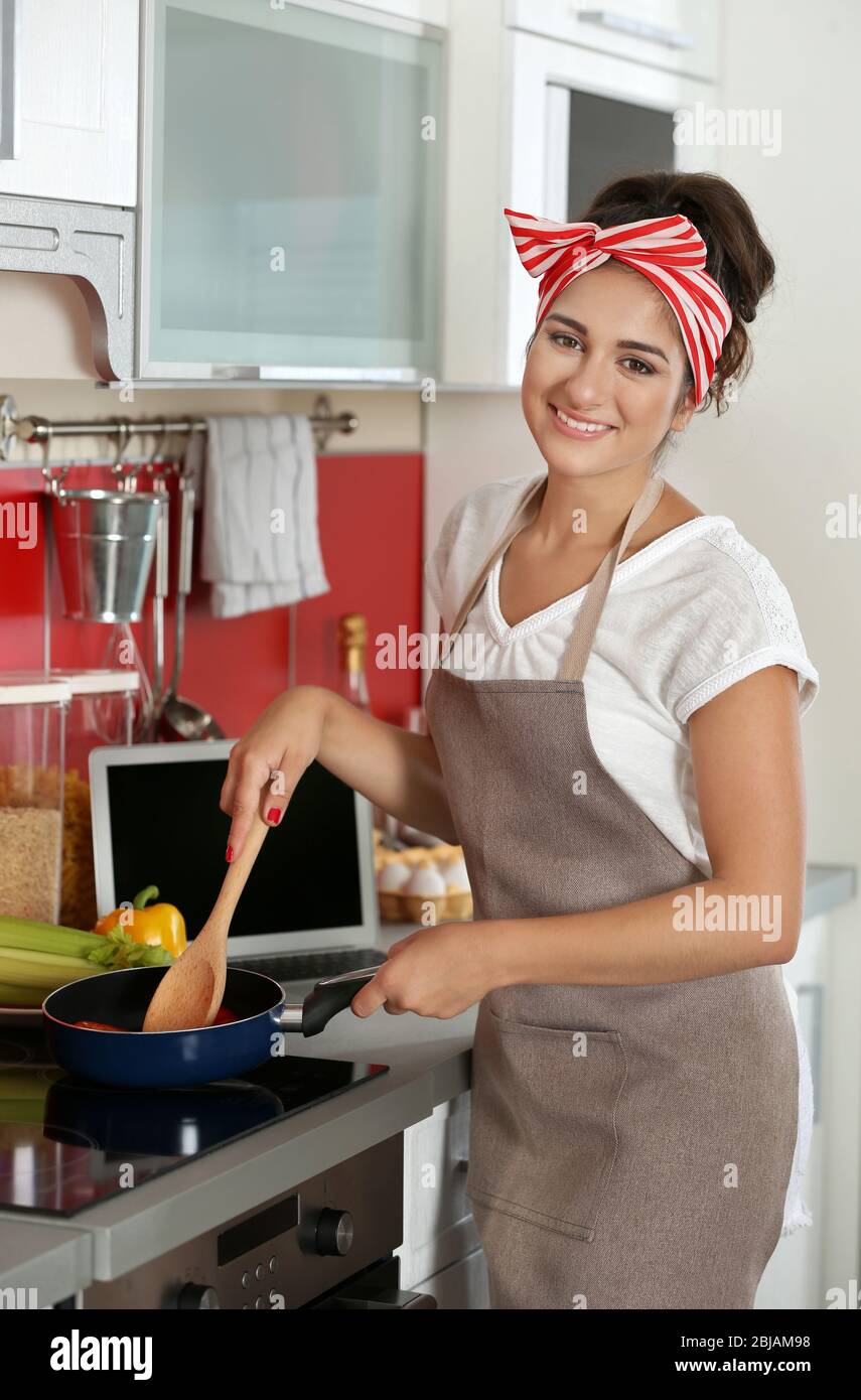 Beautiful girl cooking on kitchen. Food blogger concept Stock Photo - Alamy
